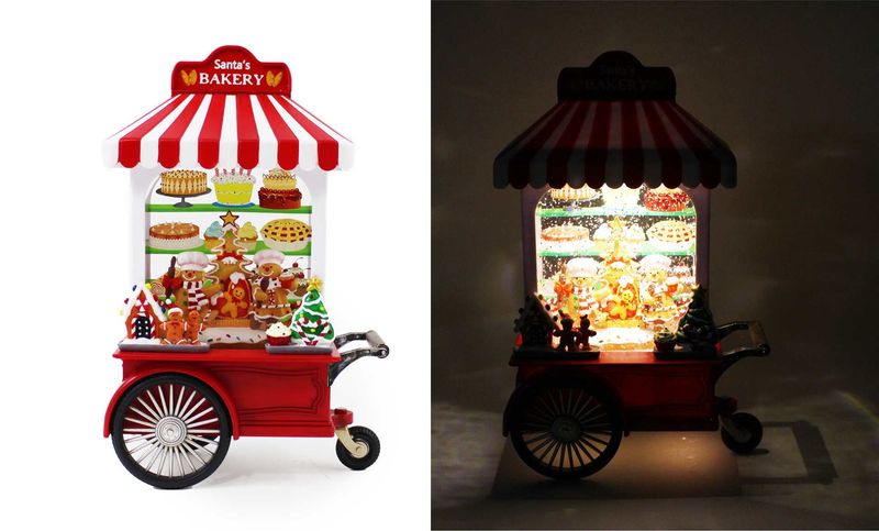 KDA67 - ILLUMINATING WATER GLITTER GLOBE - GINGERBREAD BAKERY CART