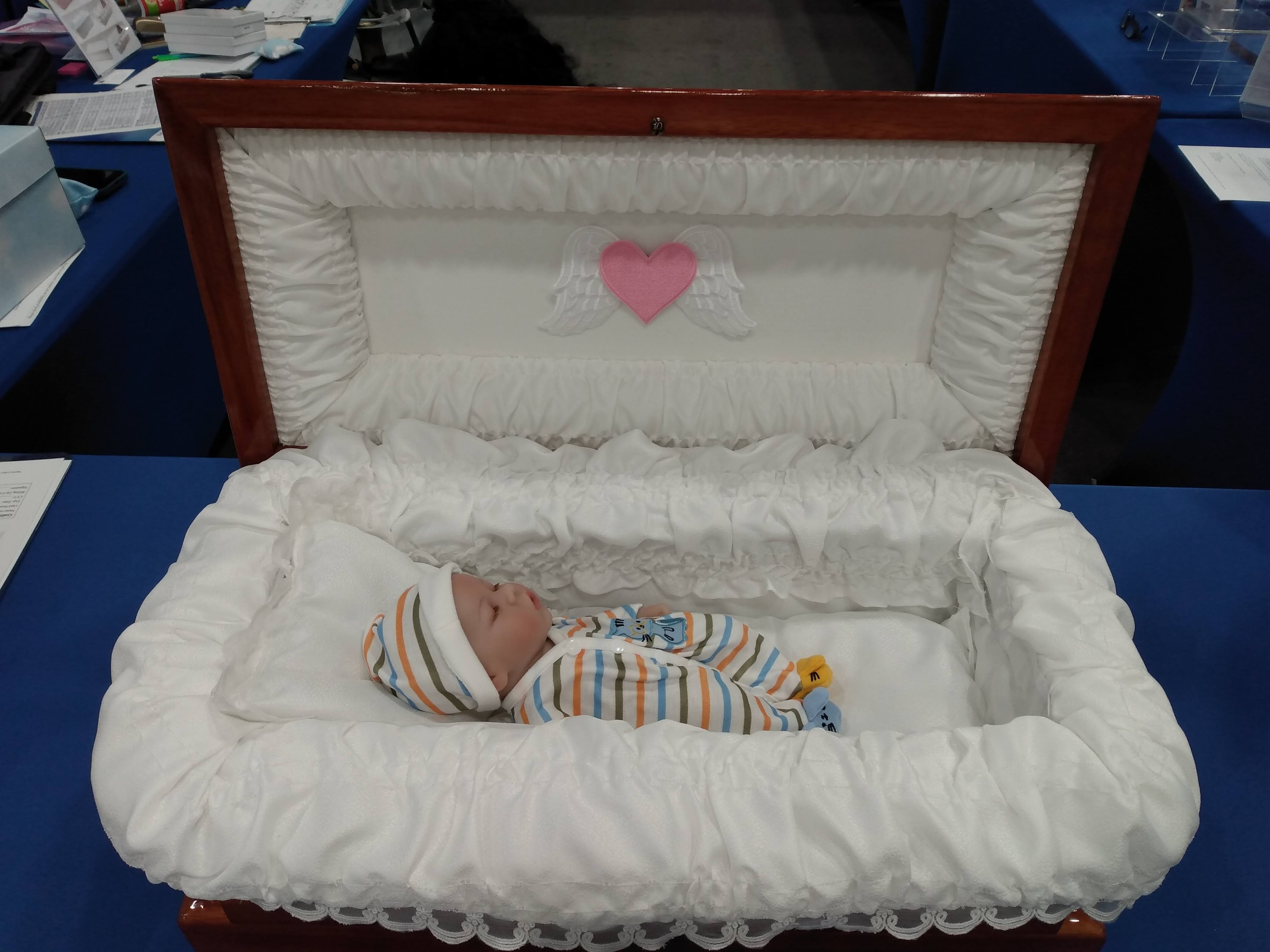 Pictures Of Dead Babies In Caskets