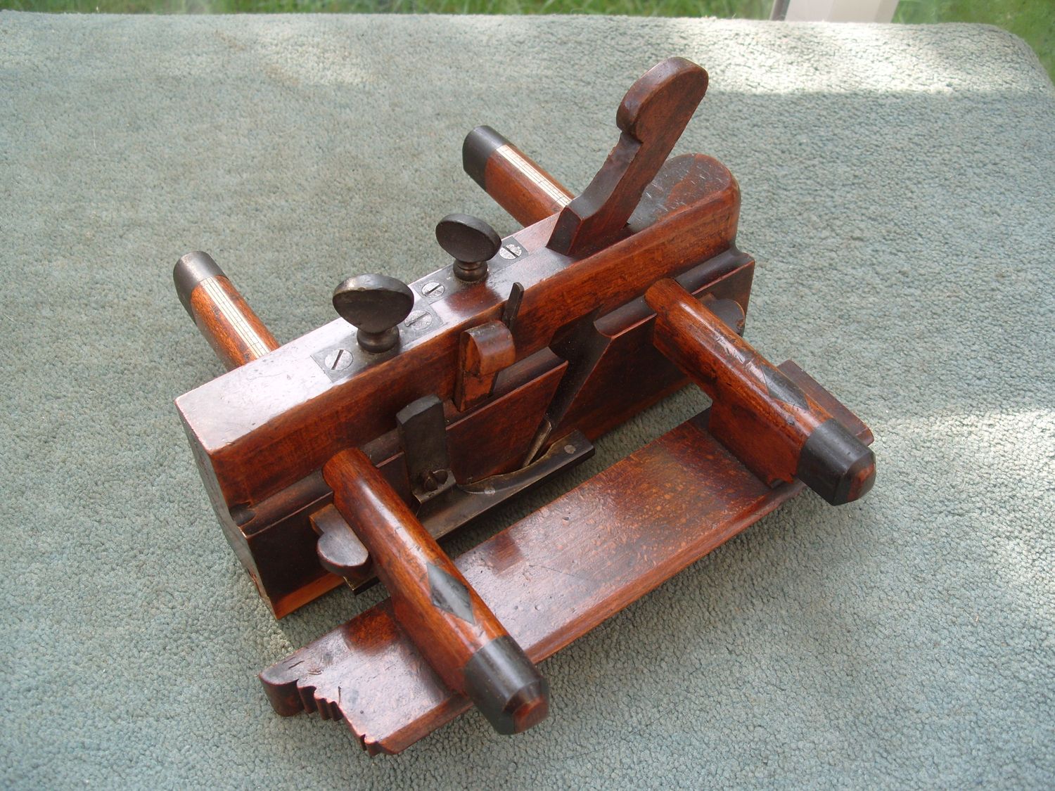 Wooden moulding planes, Old woodworking tools, chisels, saws