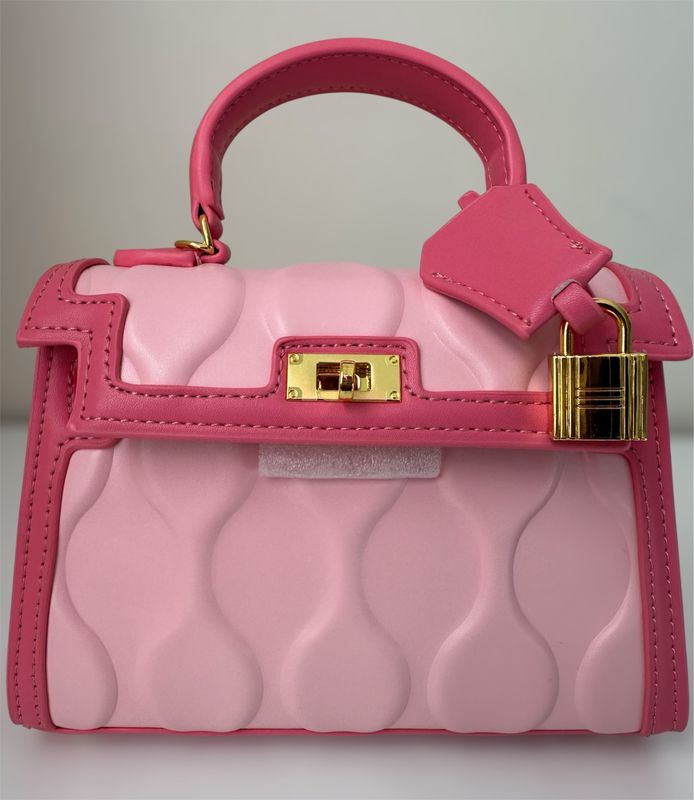 The Pink Muse- Pink Handbag with Unique Design and Gold Lock Detailing