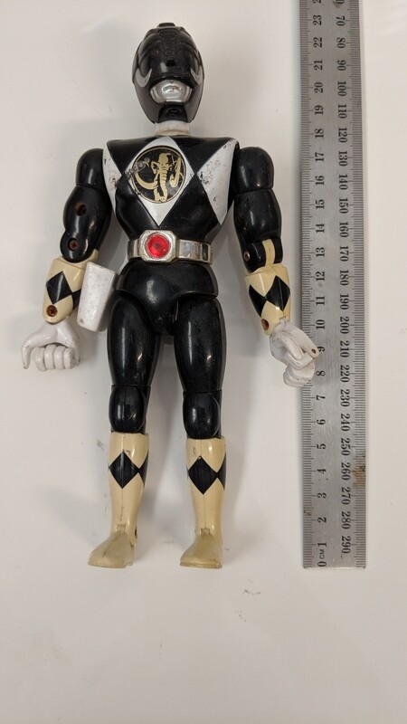 Black ranger kicking action figure
