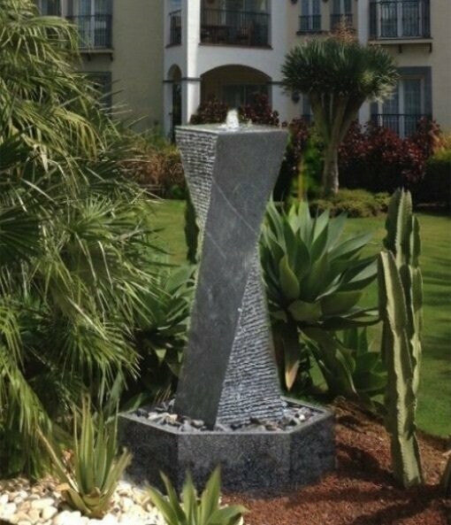 Twisted tower solid granite stone carved UK water feature reservoir base