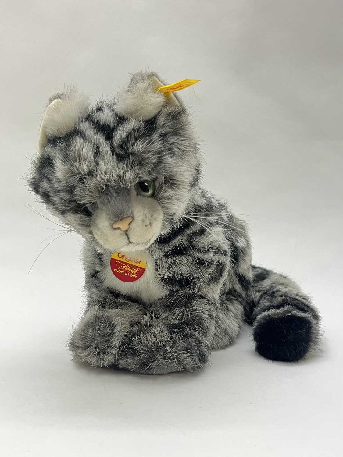 Steiff Katze Wildkatze 075155 mit Knopf, Fahne und Brustschild liegend ...