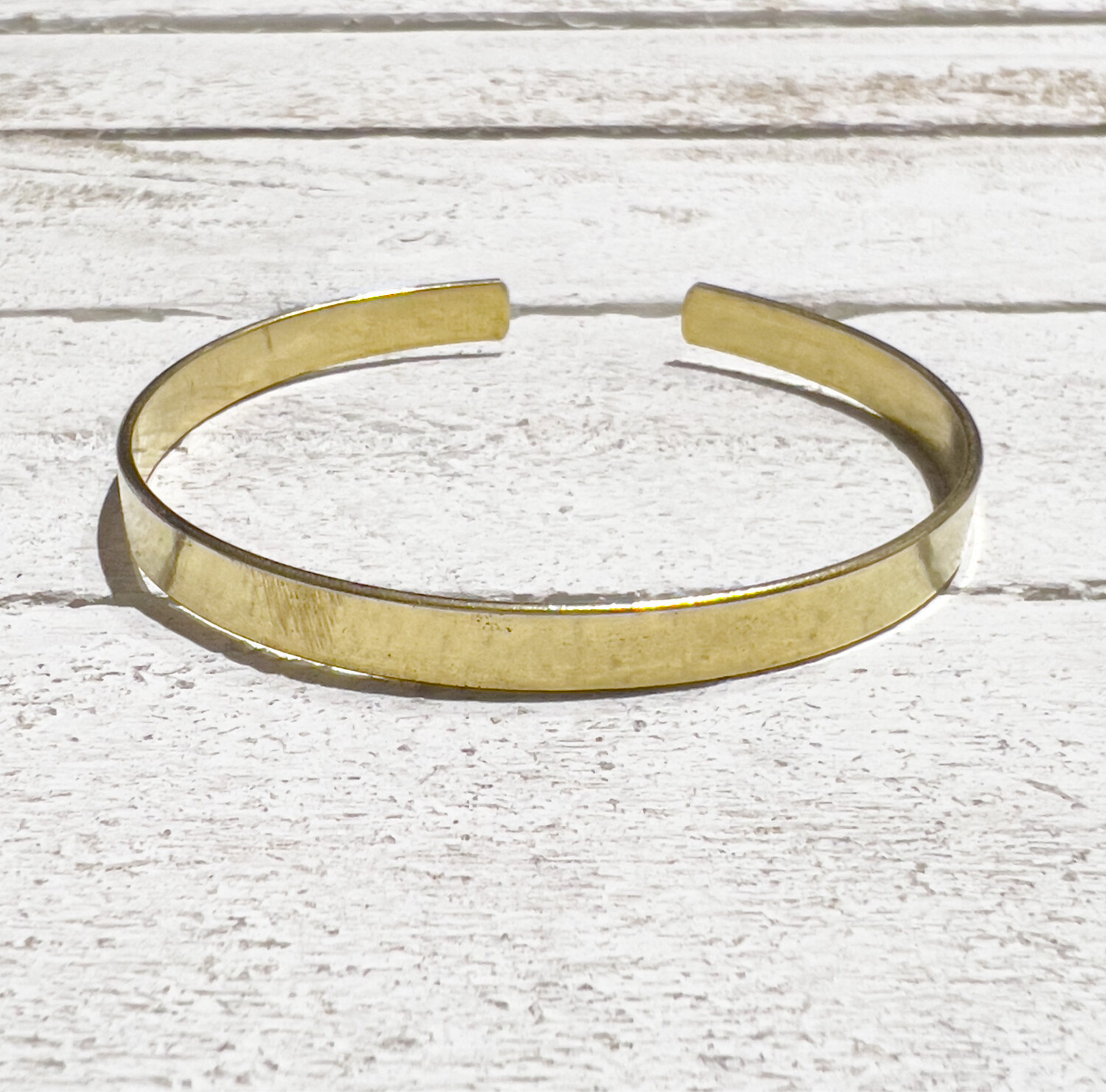 Pulsera rígida dorada latón doble ancho