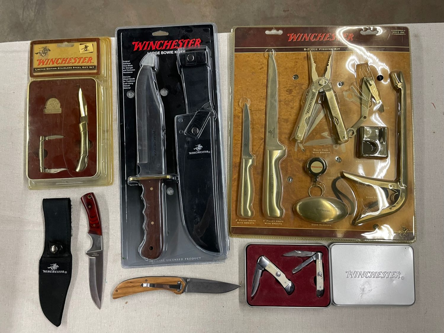 411 Winchester knives