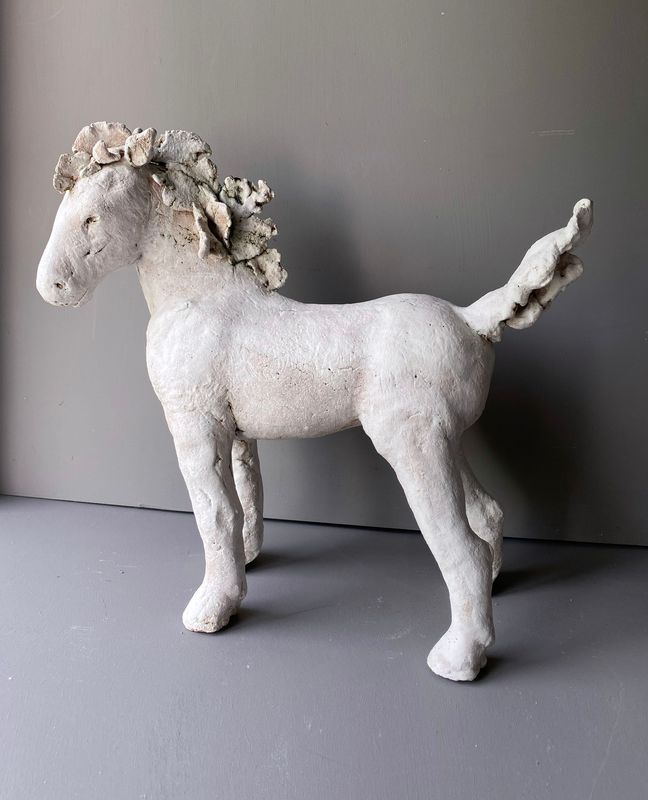 Zoe Whiteside artist making ceramic animal sculptures
