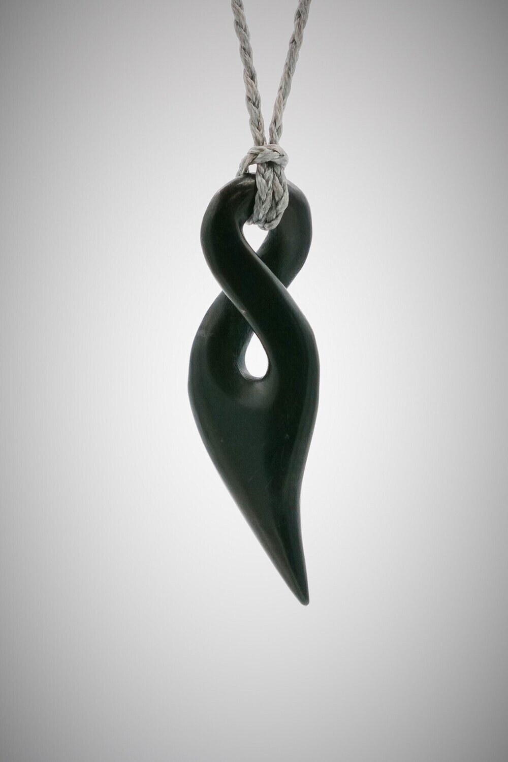 Moko Pounamu single Twist NZ Genuine Kawakawa Greenstone Kopuaranga