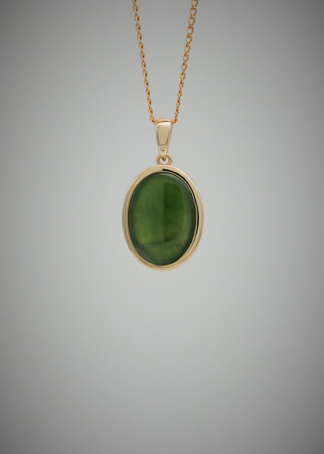 Moko Pounamu Greenstone and 9ct Gold Double Koru Filigree Oval Pendant ...