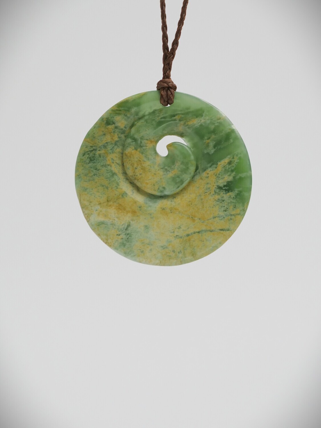 Moko Pounamu Closed Koru NZ Genuine Kahurangi Flower Greenstone - Kuaotunu