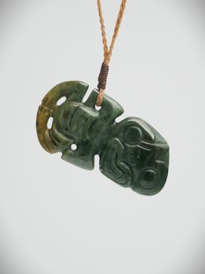 Moko Pounamu Hei Tiki NZ Genuine Inanga Flower Greenstone - Ahikouka