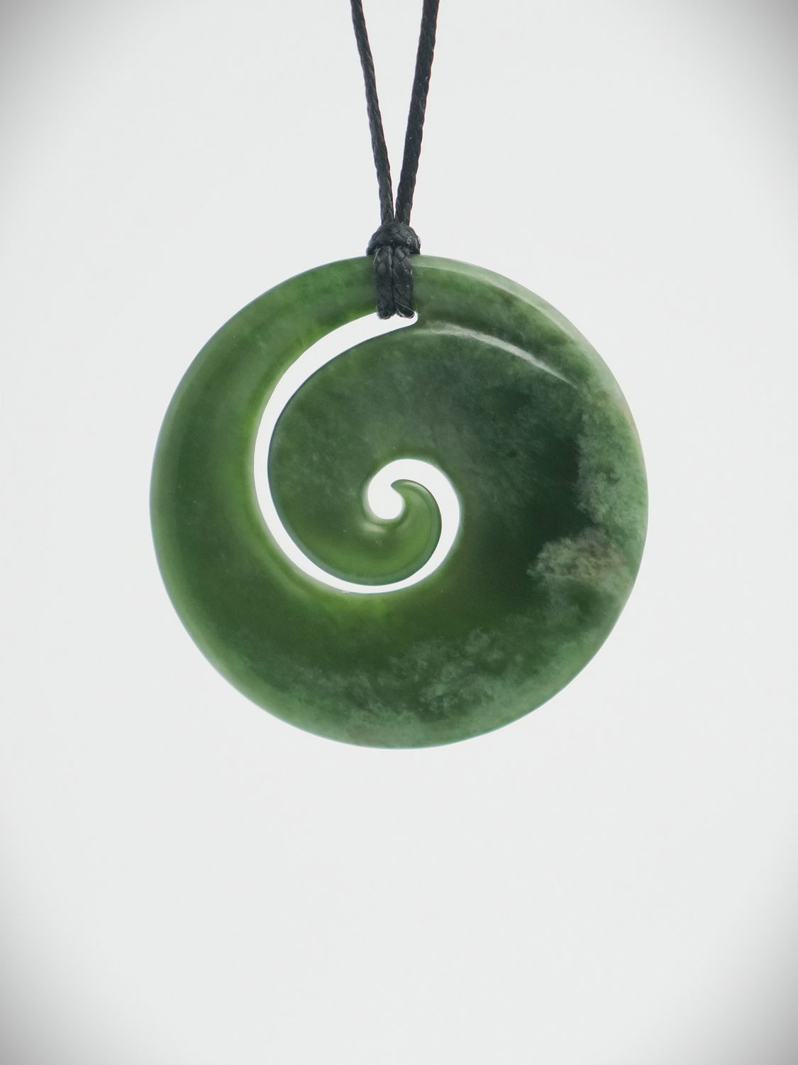 Moko Pounamu Closed Koru NZ Genuine Marsden Flower Greenstone - Paerau