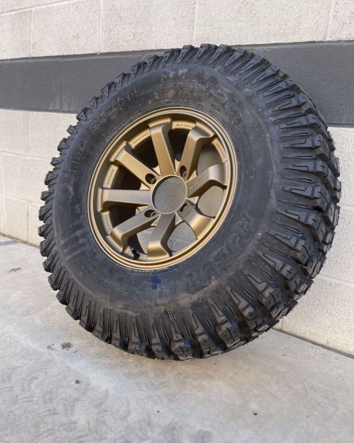 TIS 15x7 4x156 Bronze Wheels & 33x9.5-15 Arisun XD Tires FREE Mounted