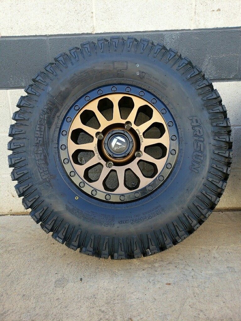 Fuel 15x7 4x156 Bronze Wheels & 33x9.5-15 Arisun Aftershock XD Tires ...