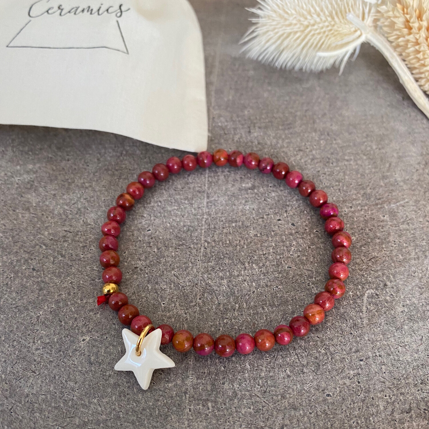 Bracelet perles rouge étoile