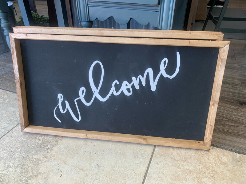 Black Welcome Sign