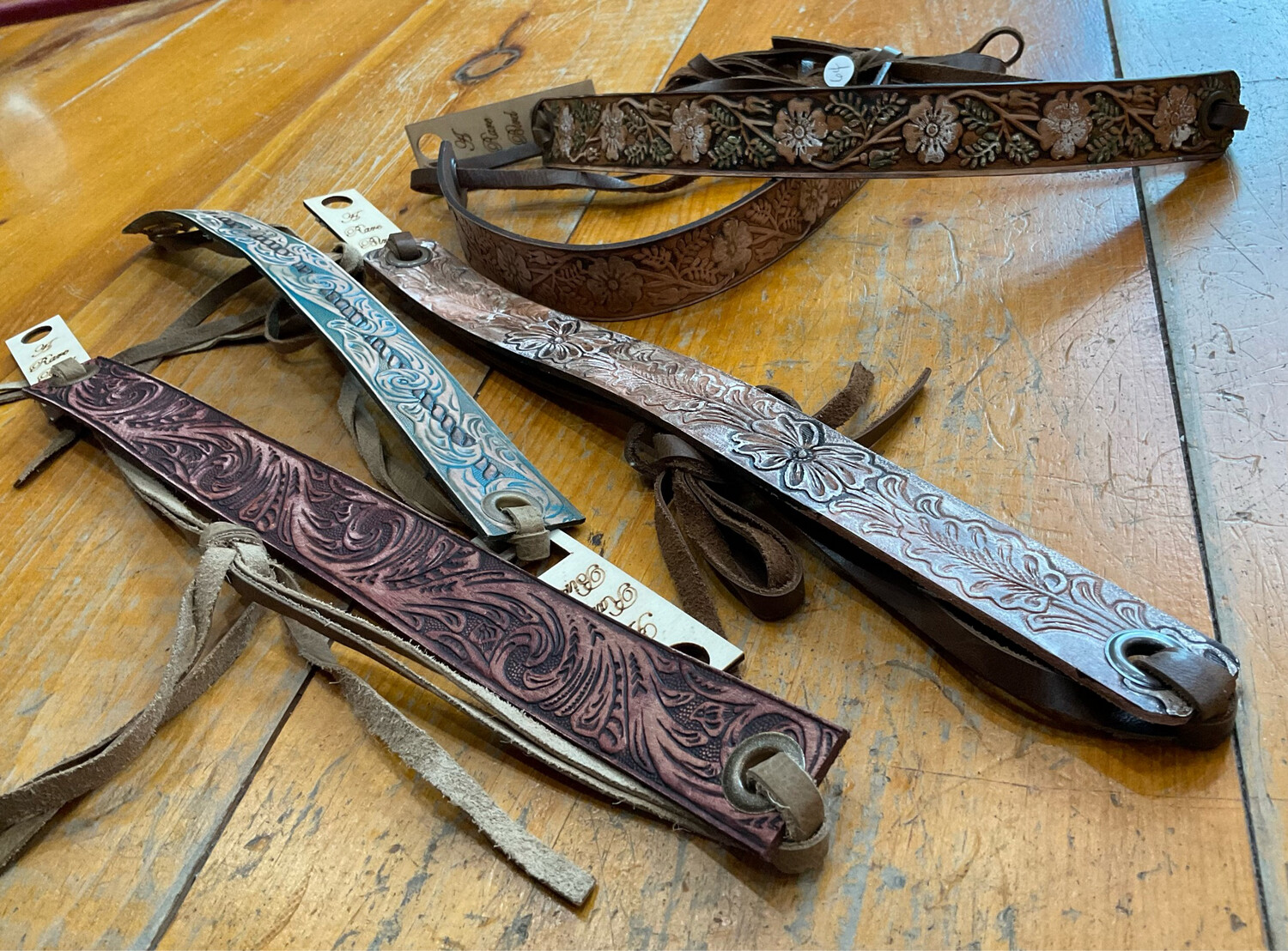 A Rare Bird Assorted Tooled Leather Hat Bands