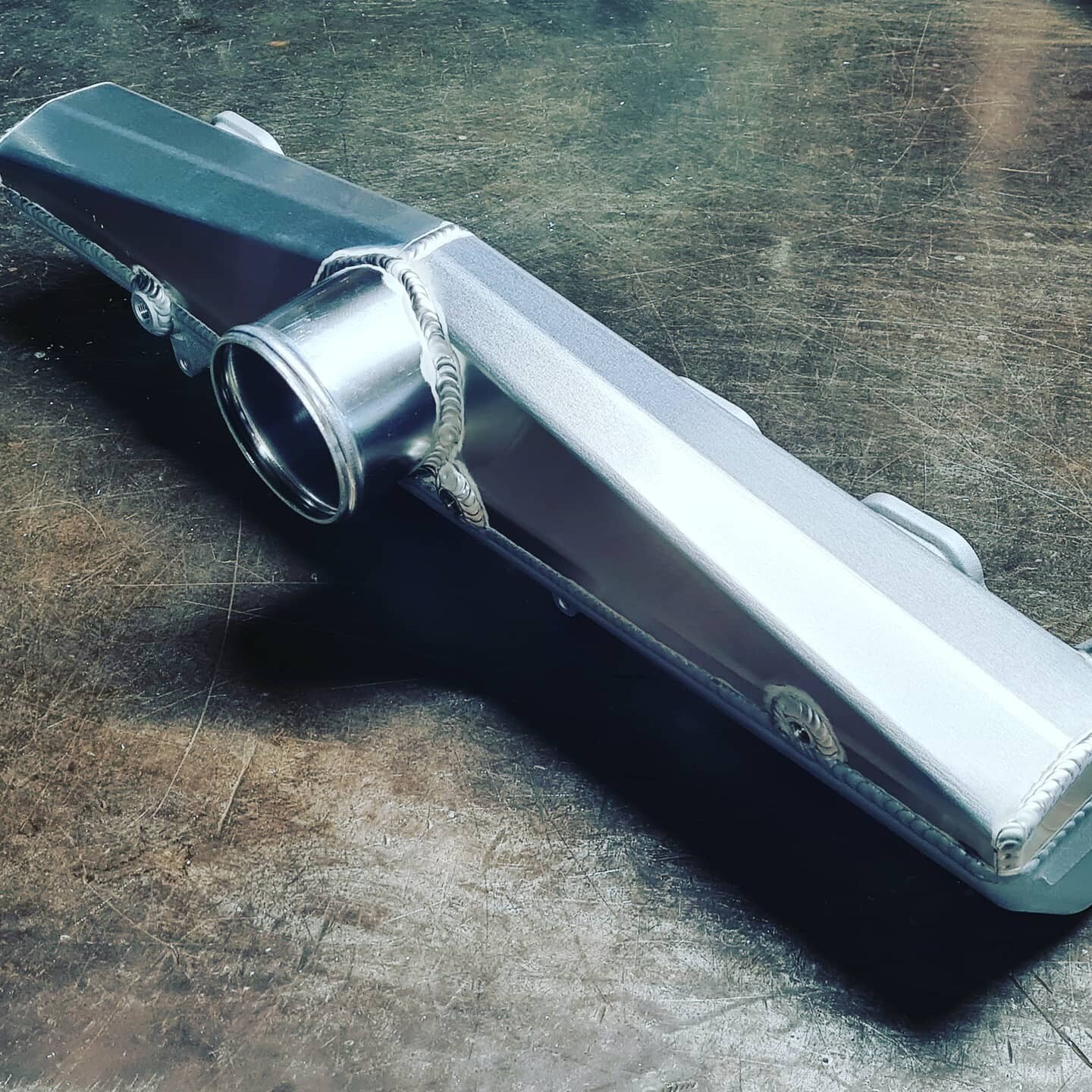 Intake manifolds and adapters