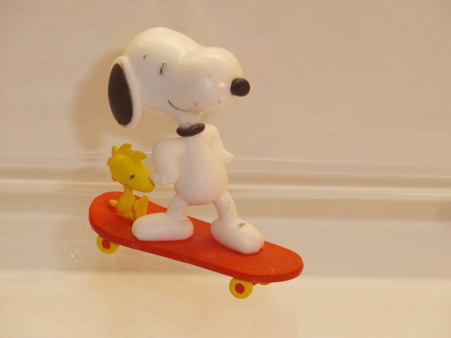 Snoopy/Peanuts: Bully 2010: Snoopy mit Woodstock auf Skateboard