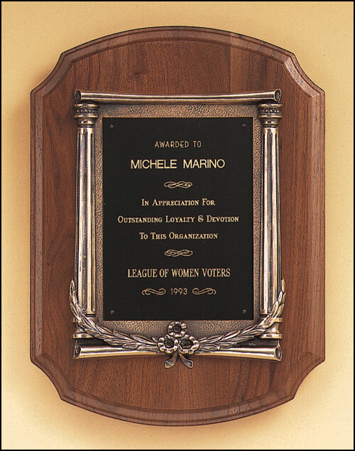 Solid American walnut plaque with an antique bronze casting