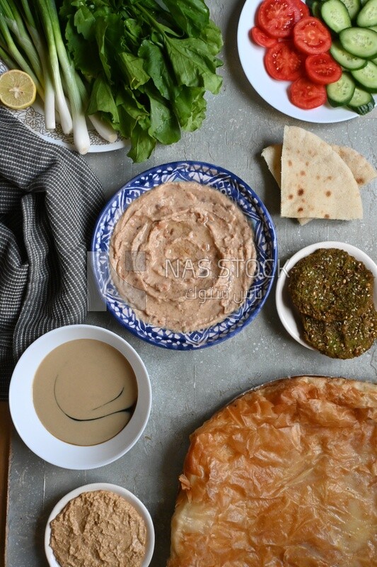 Feeter meshaltet with honey, cheese, and bread