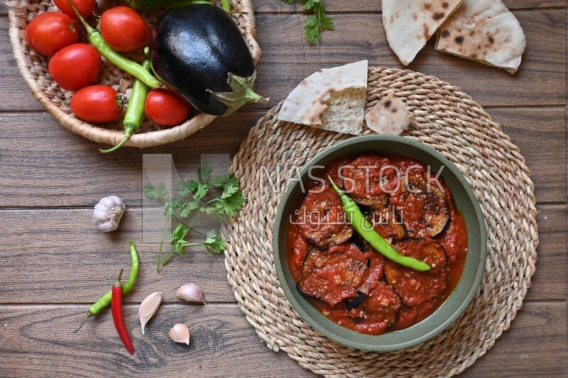 Plate of egyptian mesaka with green pepper on it.