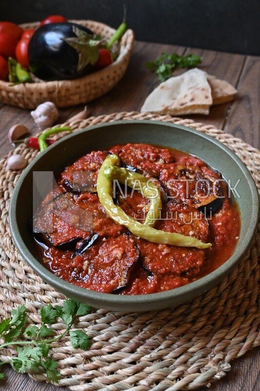 Plate of egyptian mesaka with green pepper on it.
