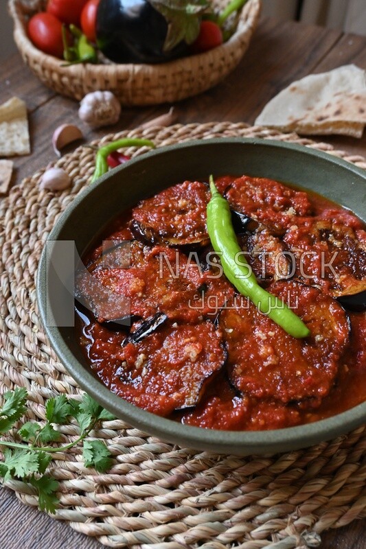 Plate of egyptian mesaka with green pepper on it.