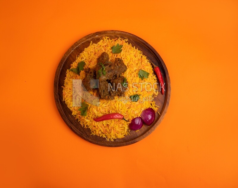 Plate of delicious biryani rice with meat, traditional Arabic dishes ...
