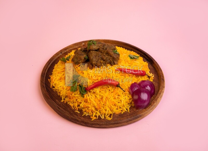 Plate of delicious biryani rice with meat, traditional Arabic dishes ...