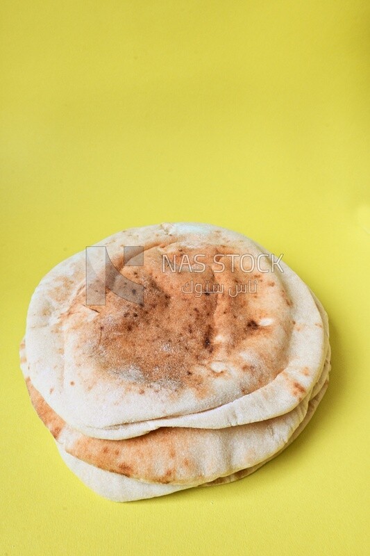 Shami bread, pieces of shami bread, fresh baked shami bread
