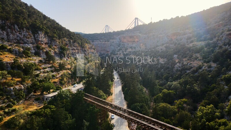 drone footage shows the Wadi Alkouf Bridge from away, Libya, history of ...