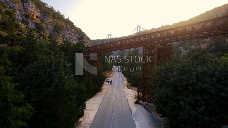 drone footage shows the Wadi Alkouf Bridge from away, Libya, history of ...