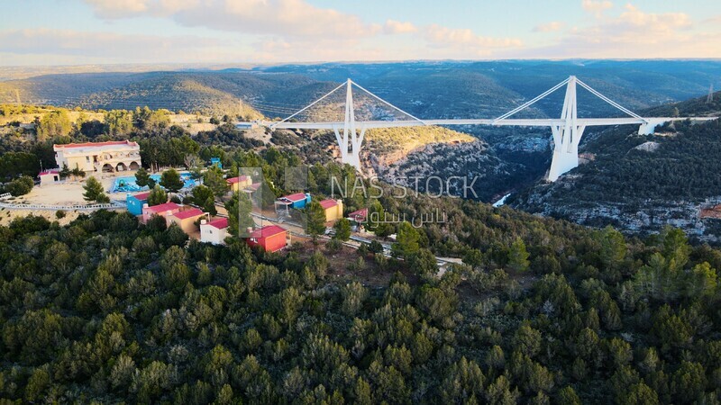drone footage shows the Wadi Alkouf Bridge from away, Libya, history of ...