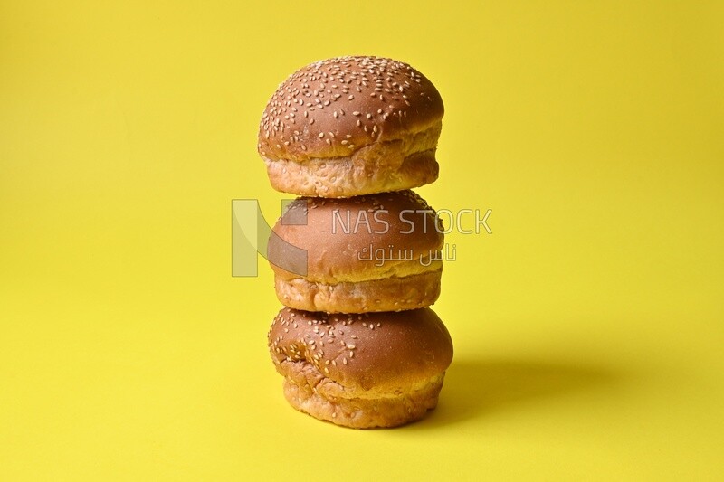 Three buns with sesame seeds, fast food, Arabic restaurants, delicious food