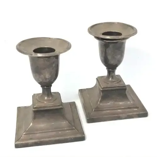 Pair of silver candle holders weighs 525 grams - no hallmarks