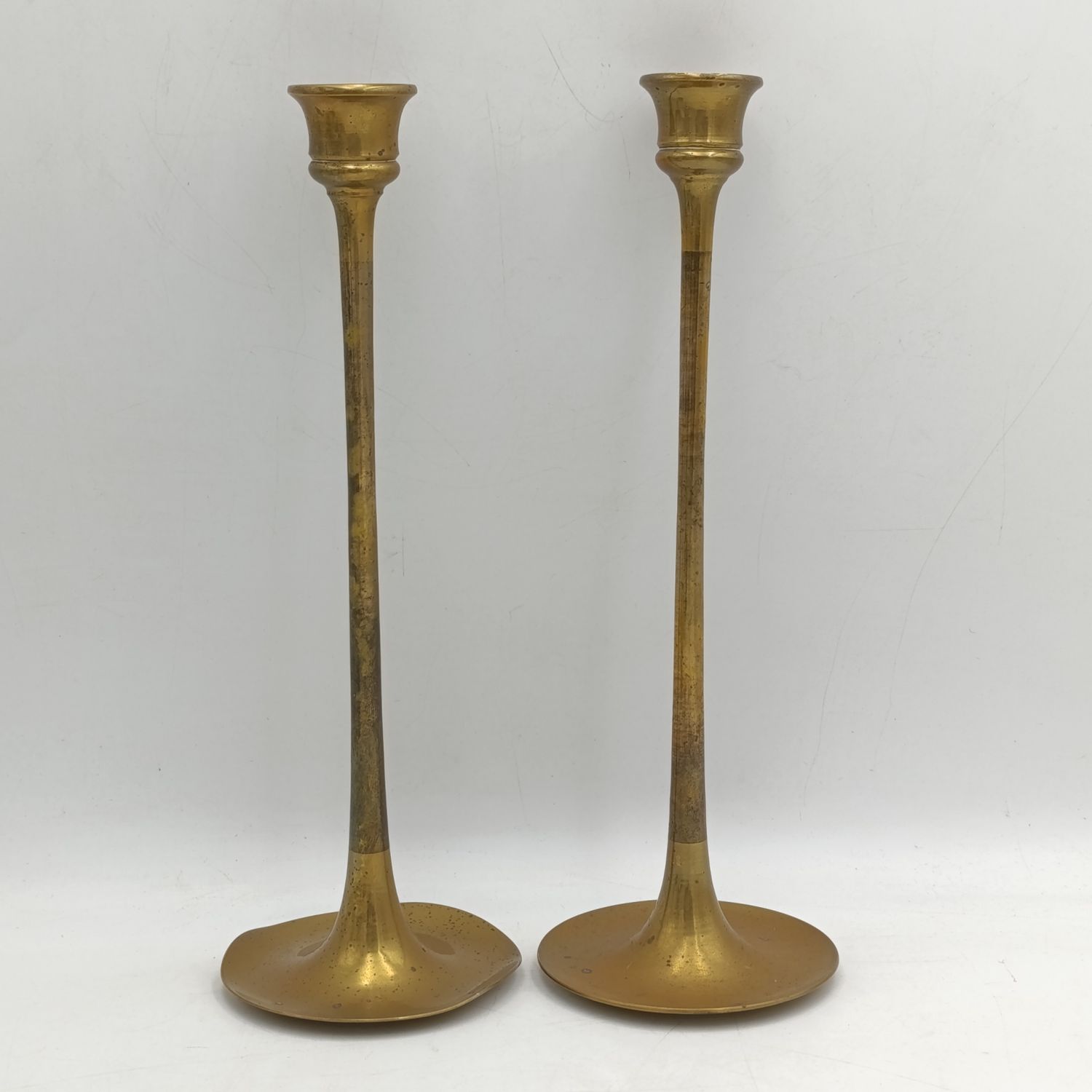 Two vintage brass candle holders