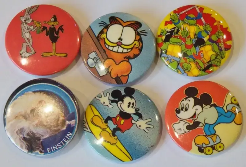 Lot of 6 vintage tinnie badges with cartoon characters and Einstein
