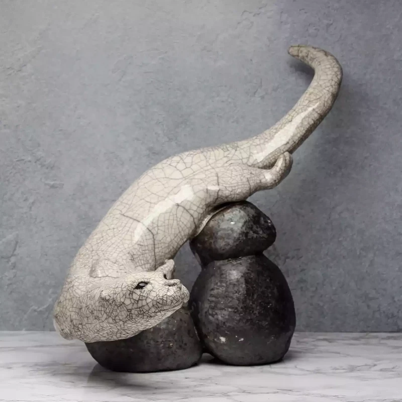 Ceramic Otter With Rocks Raku-fired Sculpture by Paul Jenkins Ceramic Otter With Rocks Raku-fired Sculpture by Paul Jenkins