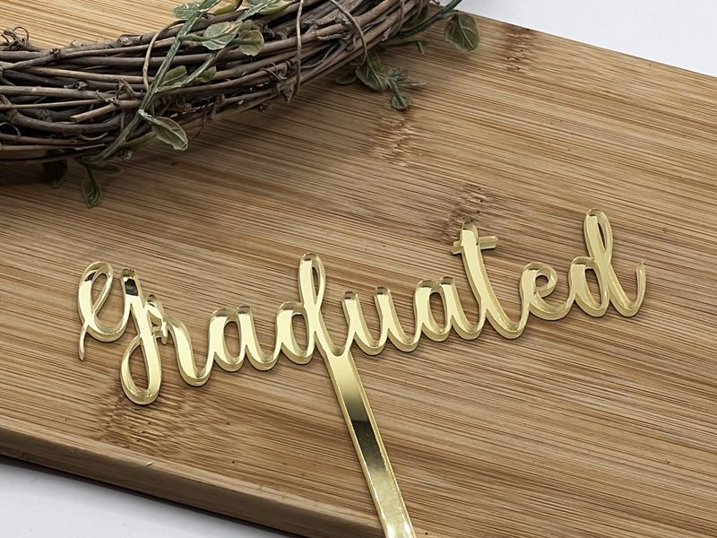 Graduated cake topper