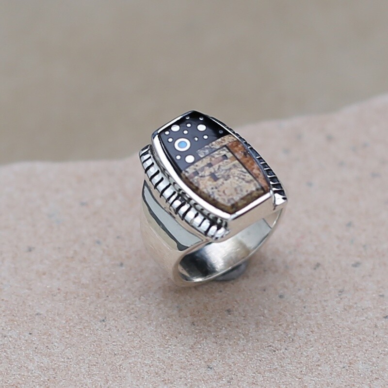 Adobe Pueblo ring with detailed stamping