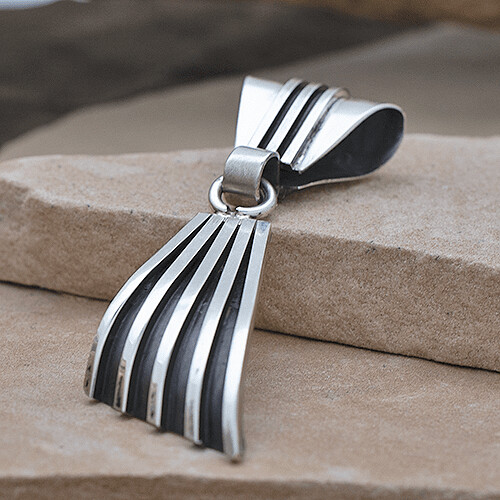 Tom Hawk long channel pendant