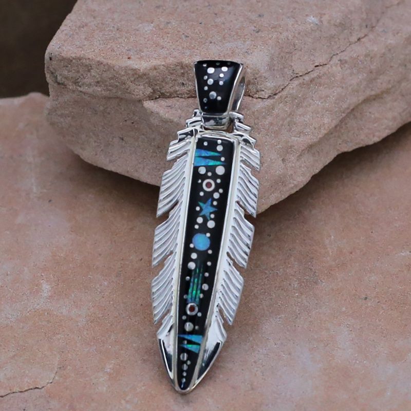 Long detailed feather pendant w/ night sky inlay