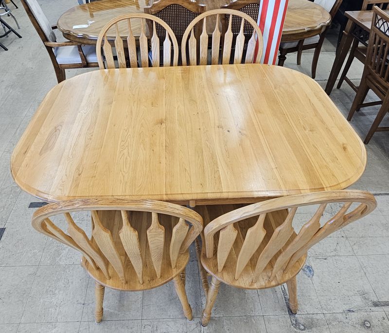 Solid oak oval dining table with 4 chairs