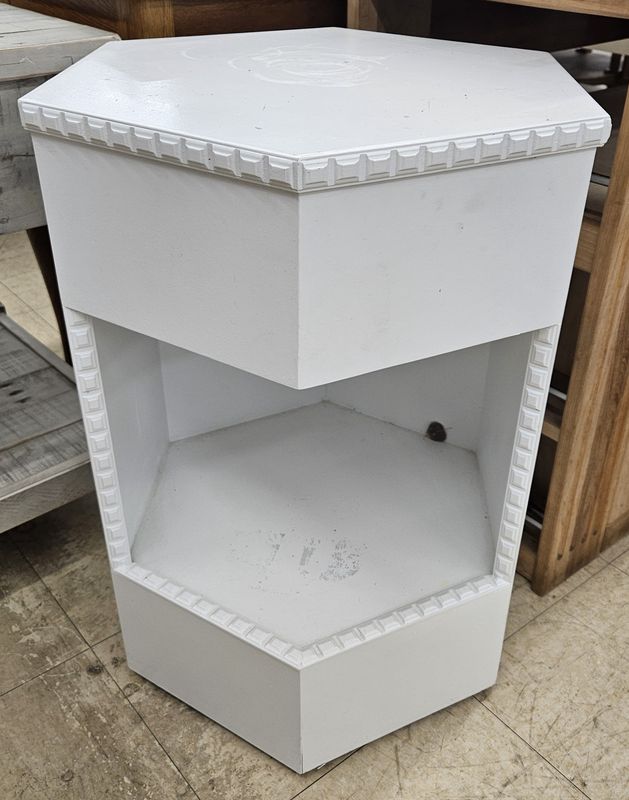 White hexagonal corner shelf unit