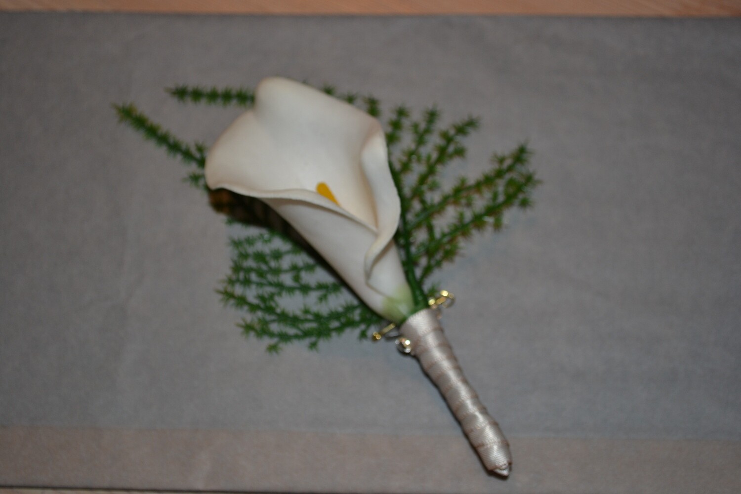 Calla Lily Buttonholes with asparagus Fern