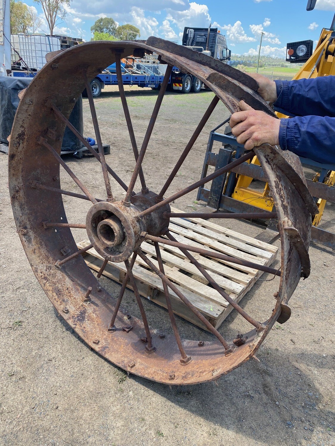 Sunshine antique harvester wheel